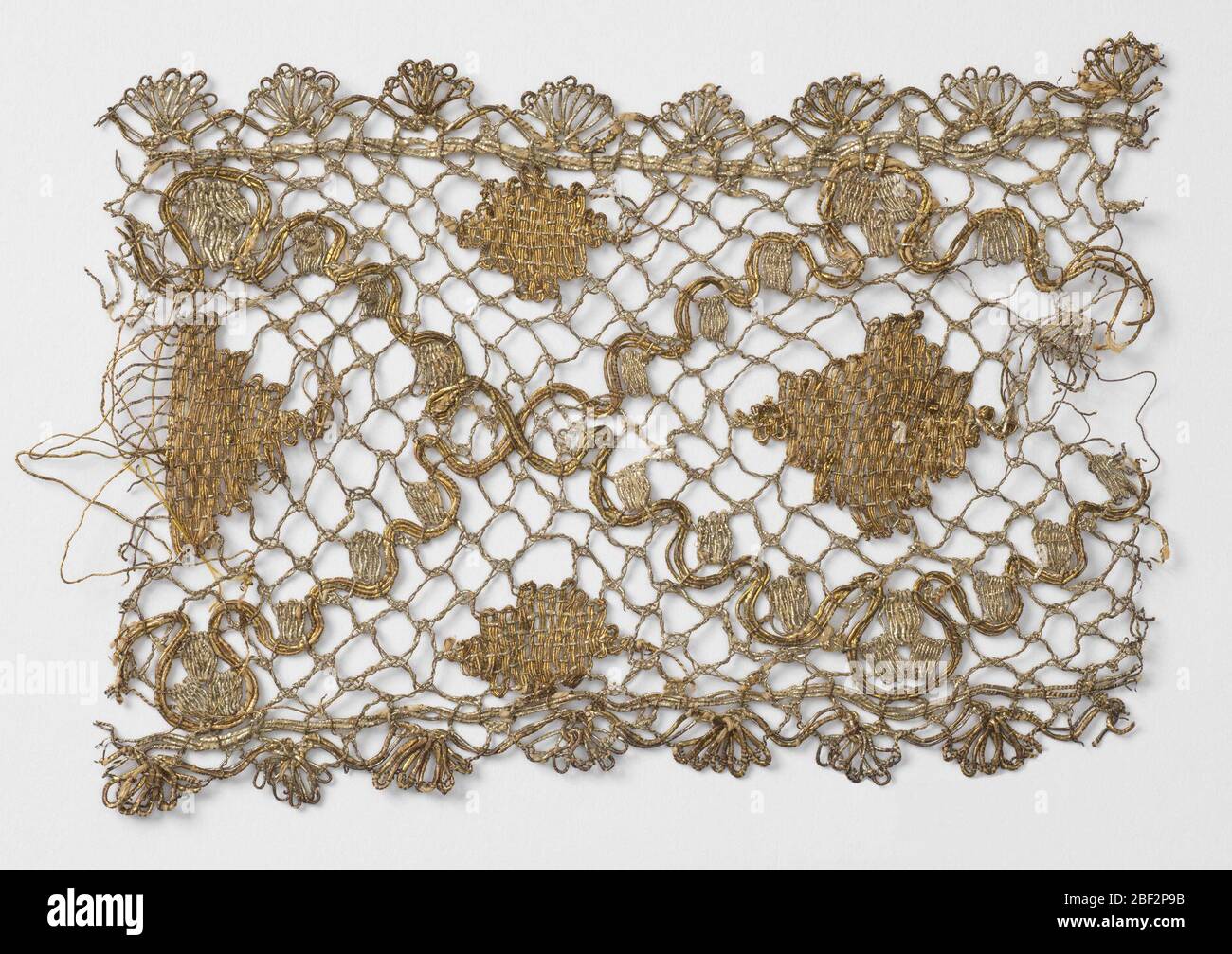 Fragment. Fragment has a design of crossing lines with solidly worked ...