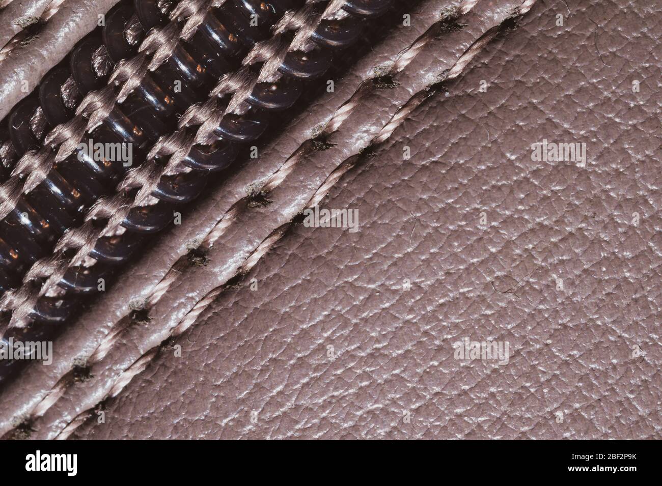 Leather background with zipper closure. material with seams close up ...