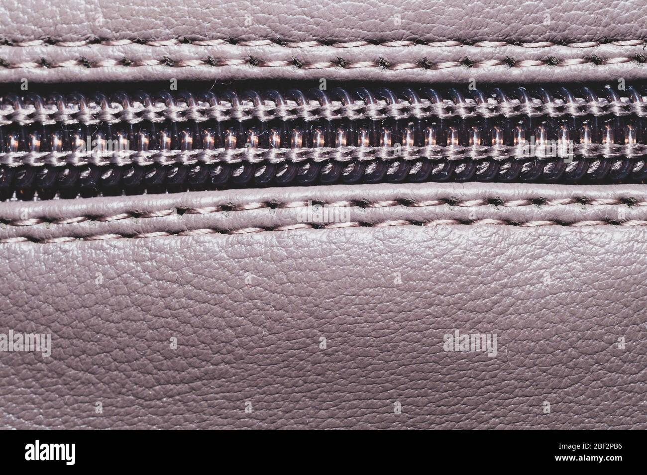 Leather background with zipper closure. material with seams close up ...