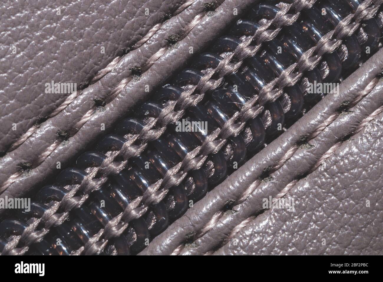 Leather background with zipper closure. material with seams close up ...