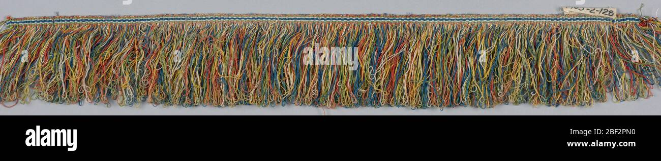 Fringe. Fringe in green, yellow, red, blue, and white striped heading ...