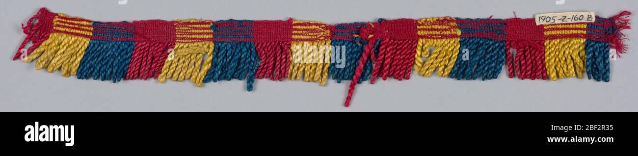 Fringe. Red, blue and yellow fringe with a soumak heading. Skirt ...