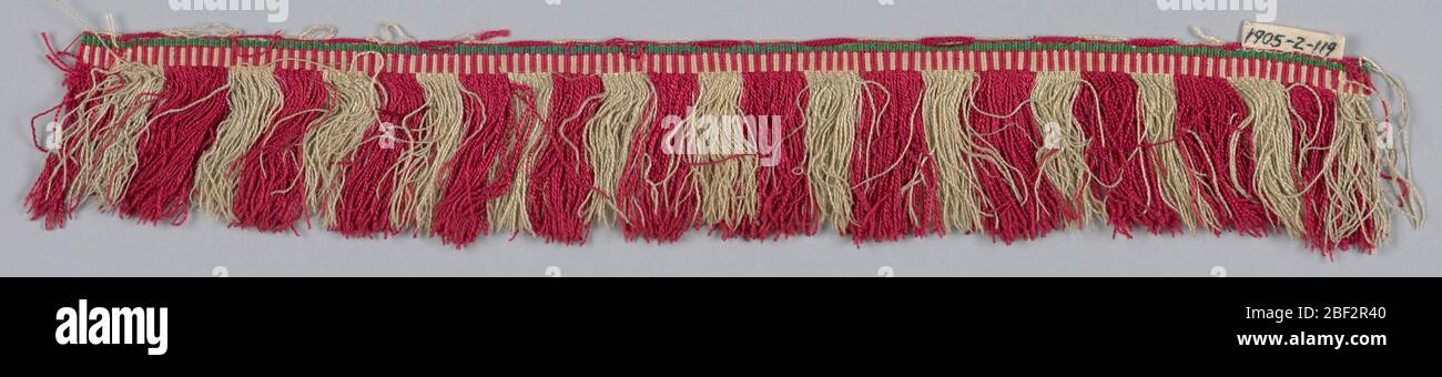 Fringe. Fringe in green, red and white with a patterned heading and ...