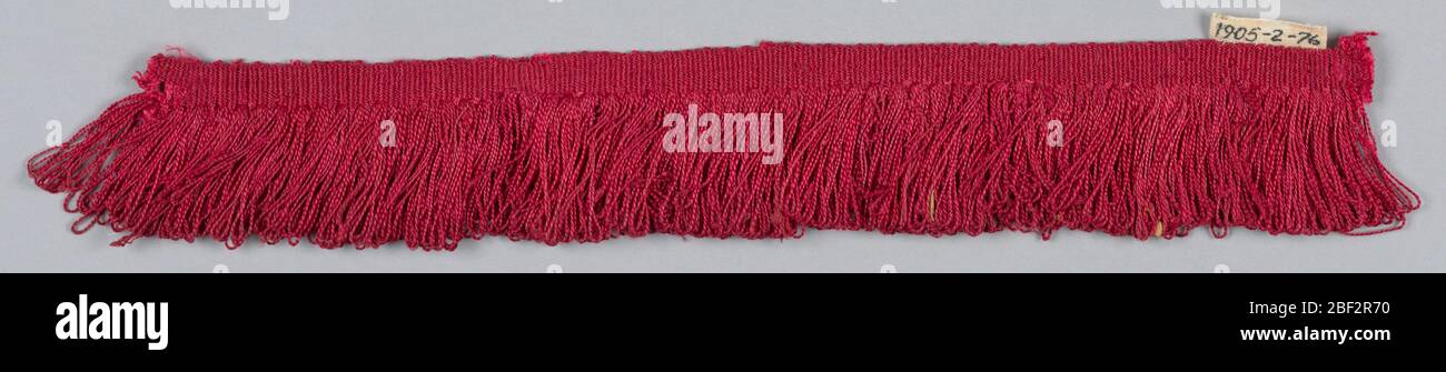 Fringe. Red fringe with a plain-woven heading and a skirt of red loops ...