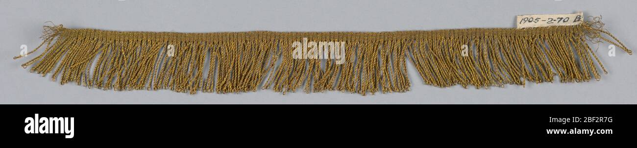 Fringe. Gold fringe with a plain-woven heading and a skirt of looped ...