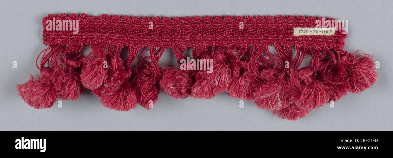Trimming. Red woven heading finished with loops and tassels Stock Photo ...
