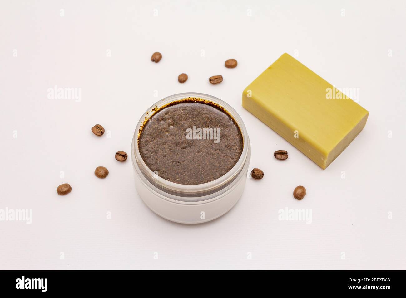 Coffee body scrub and soap isolated on white background. Spa concept ...