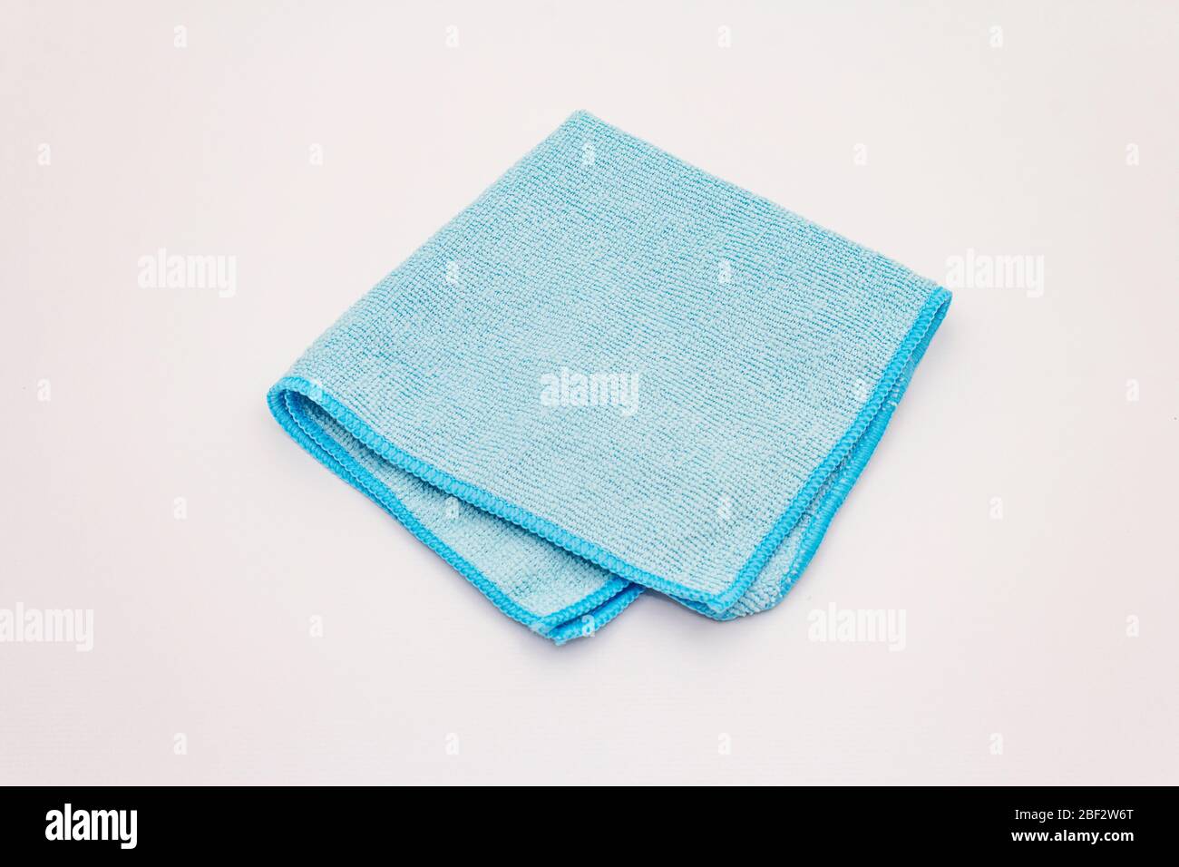 Blue duster isolated on white background. House cleaning product, home ...