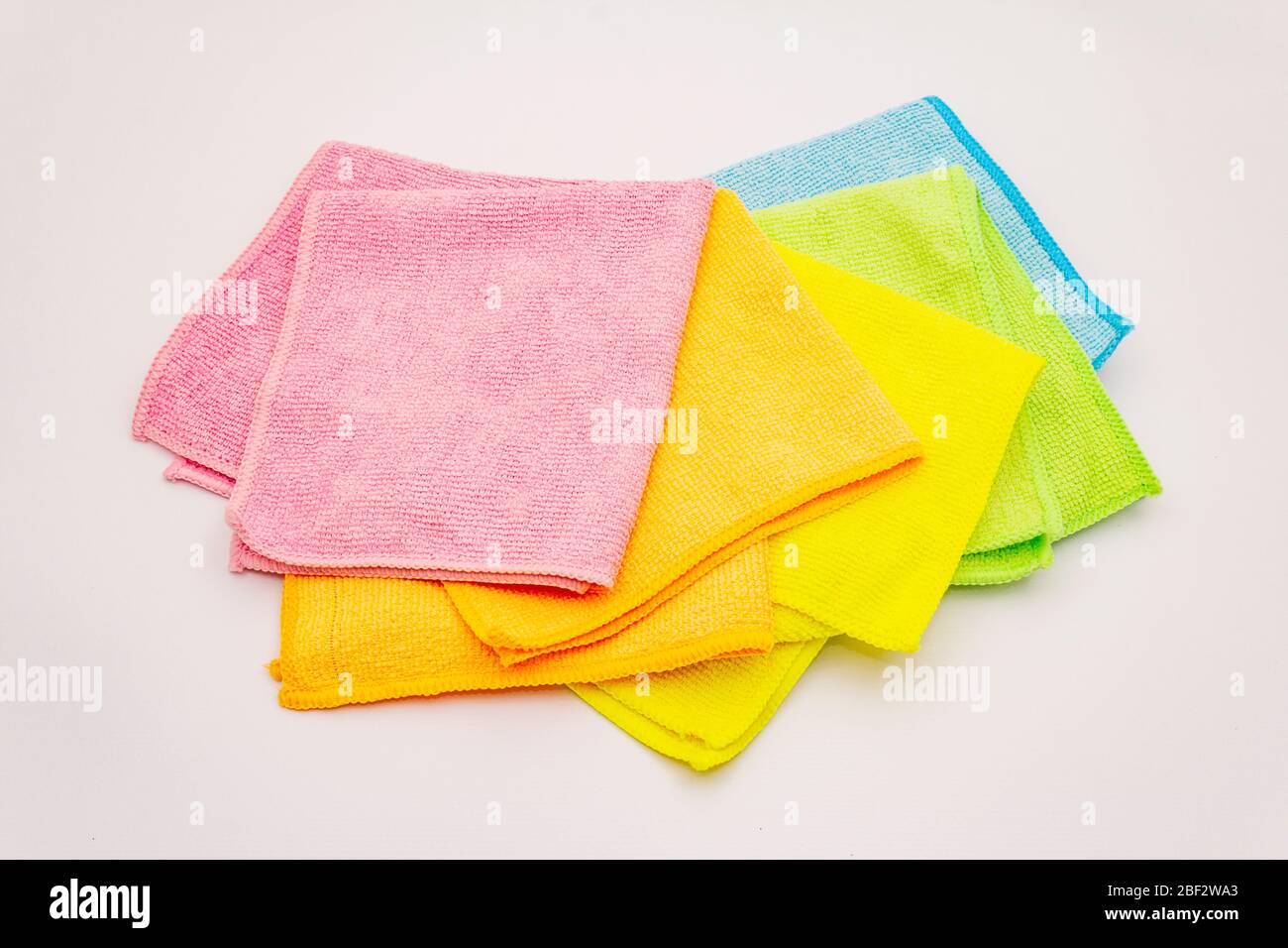 Set of colorful dusters isolated on white background. House cleaning ...