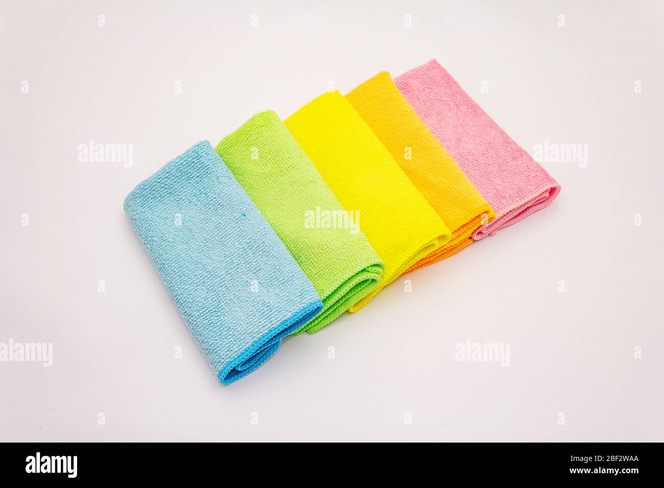 Set of colorful dusters isolated on white background. House cleaning ...