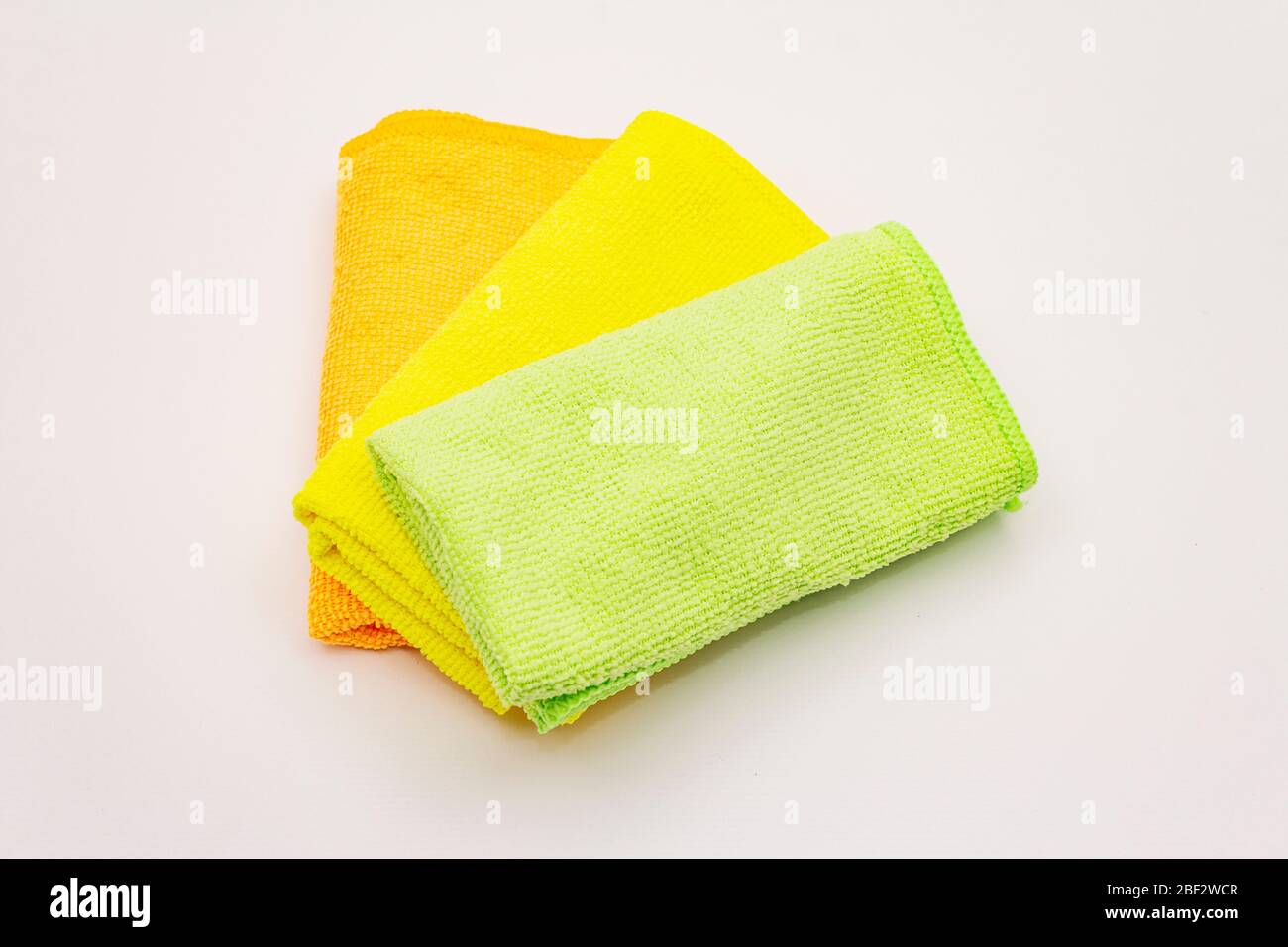 Set of colorful dusters isolated on white background. House cleaning ...