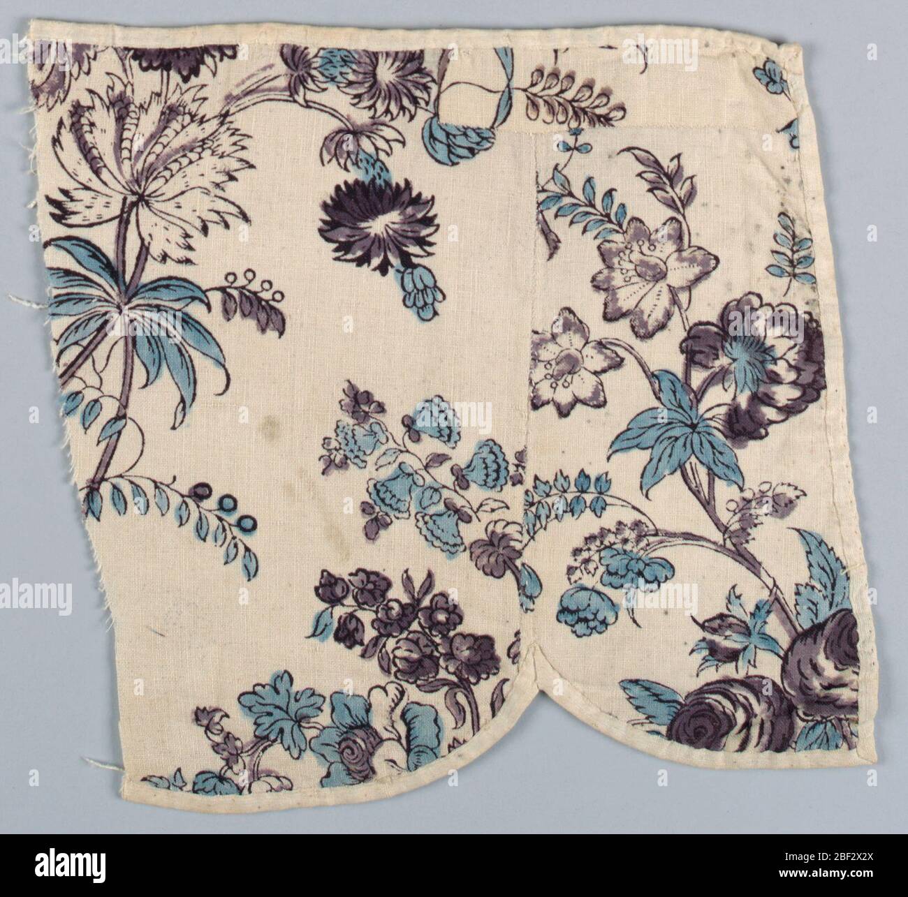 Fragment. Stylistic flowers in purple, light blue and black on an off ...