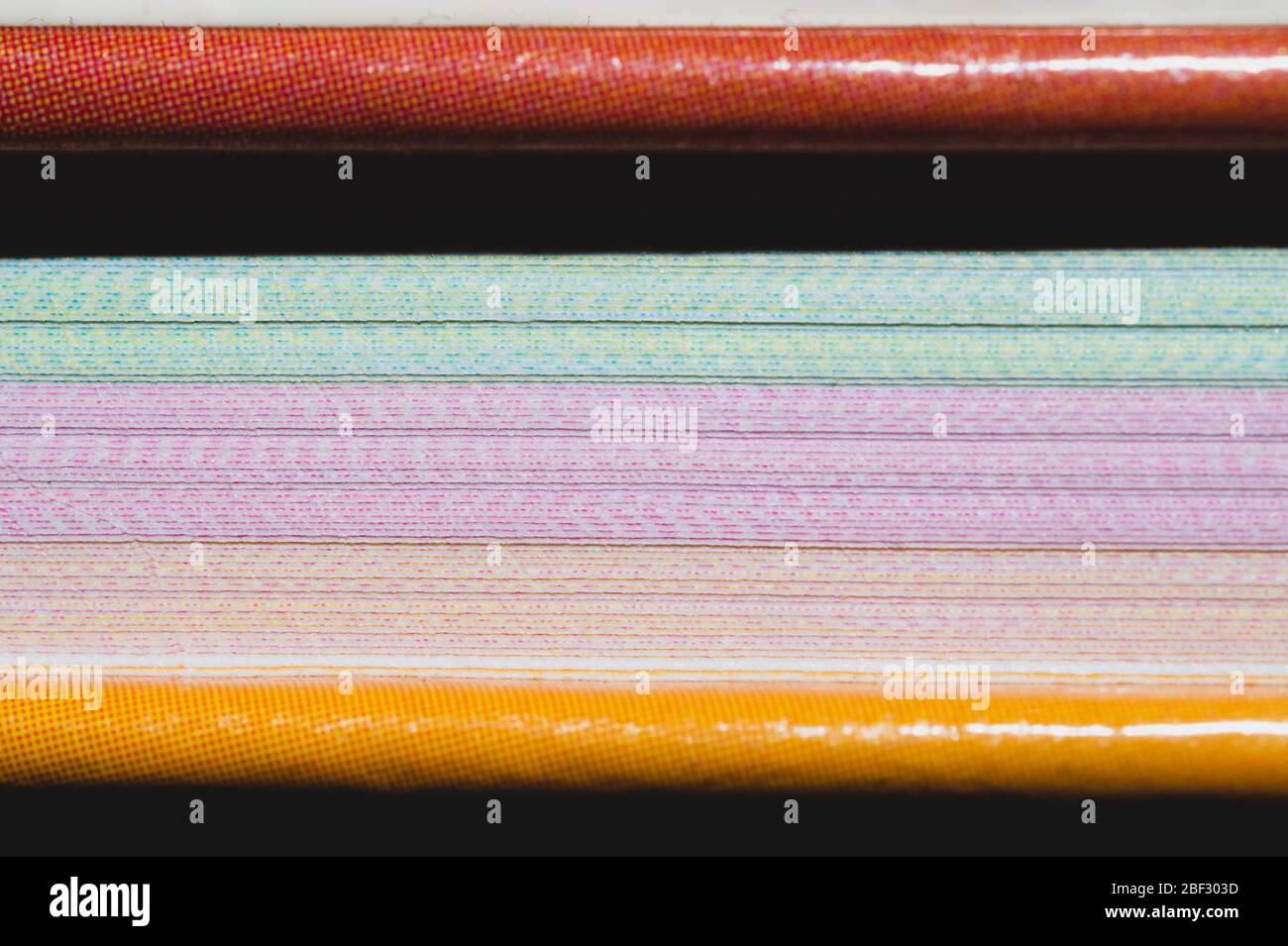 Colorful book pages close up. book edge macro Stock Photo - Alamy
