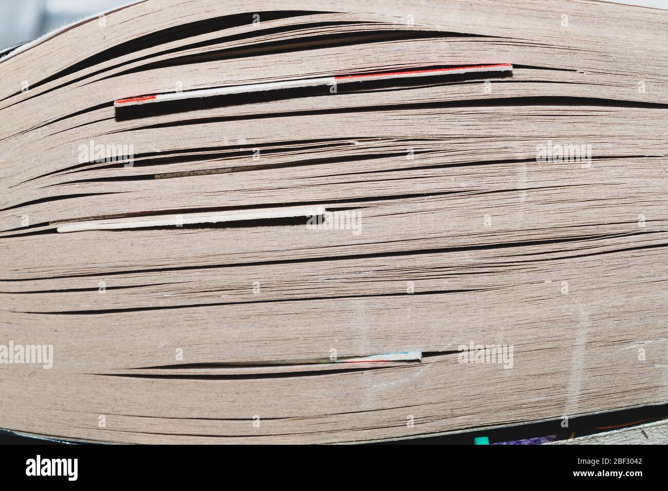 Book edge macro. book with bookmarks Stock Photo - Alamy