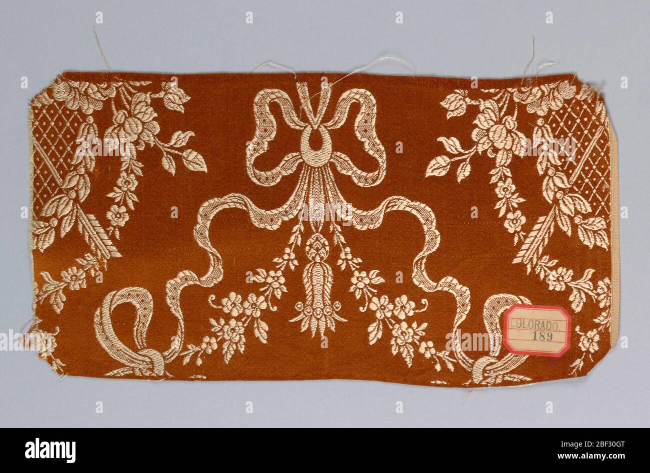 Samples. a. rust color warp and gold/tan color weftb. rust color warp ...