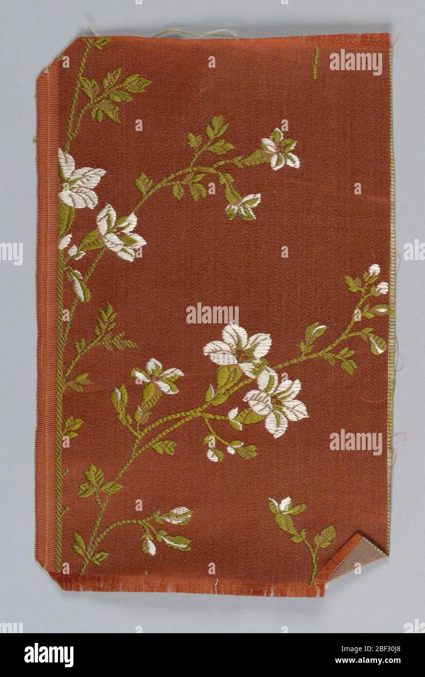 Sample. Rust color warp and green and white wefts forming a floral ...