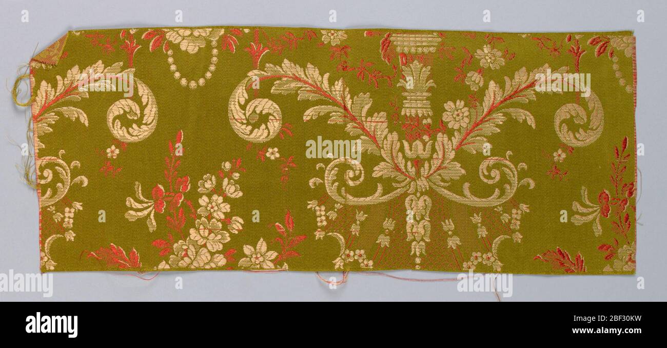 Sample. Green/yellow warp and red and gold color wefts Stock Photo - Alamy