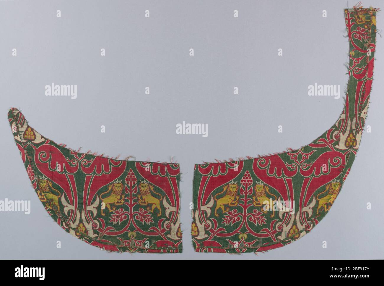 Fragment. Irregularly shaped fragment of woven silk. Large, curving ...