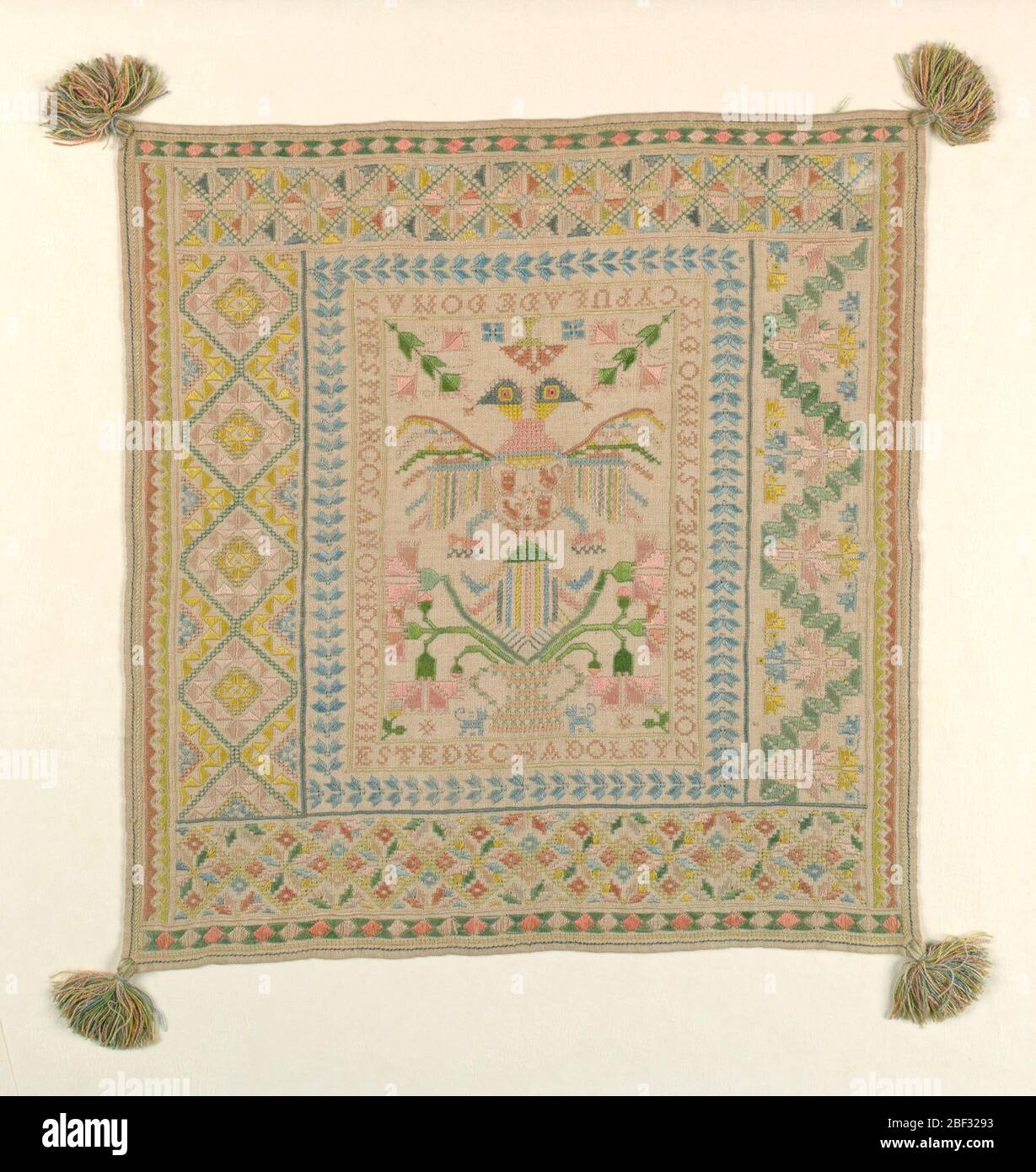 Sampler. In the center, a double-headed eagle and the shield of Castile ...
