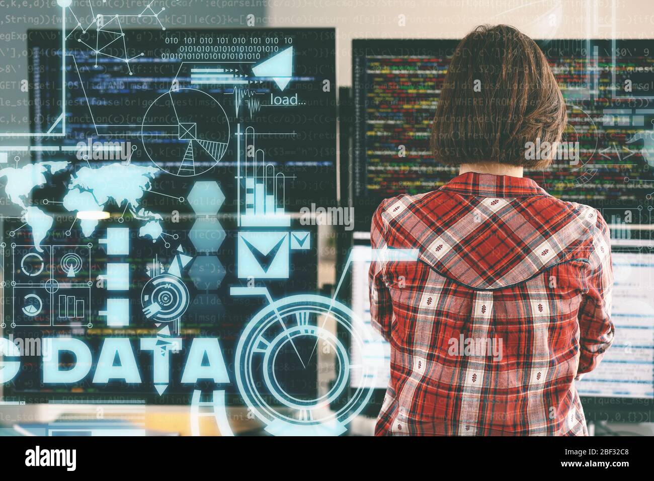Female programmer working in office, back view Stock Photo - Alamy