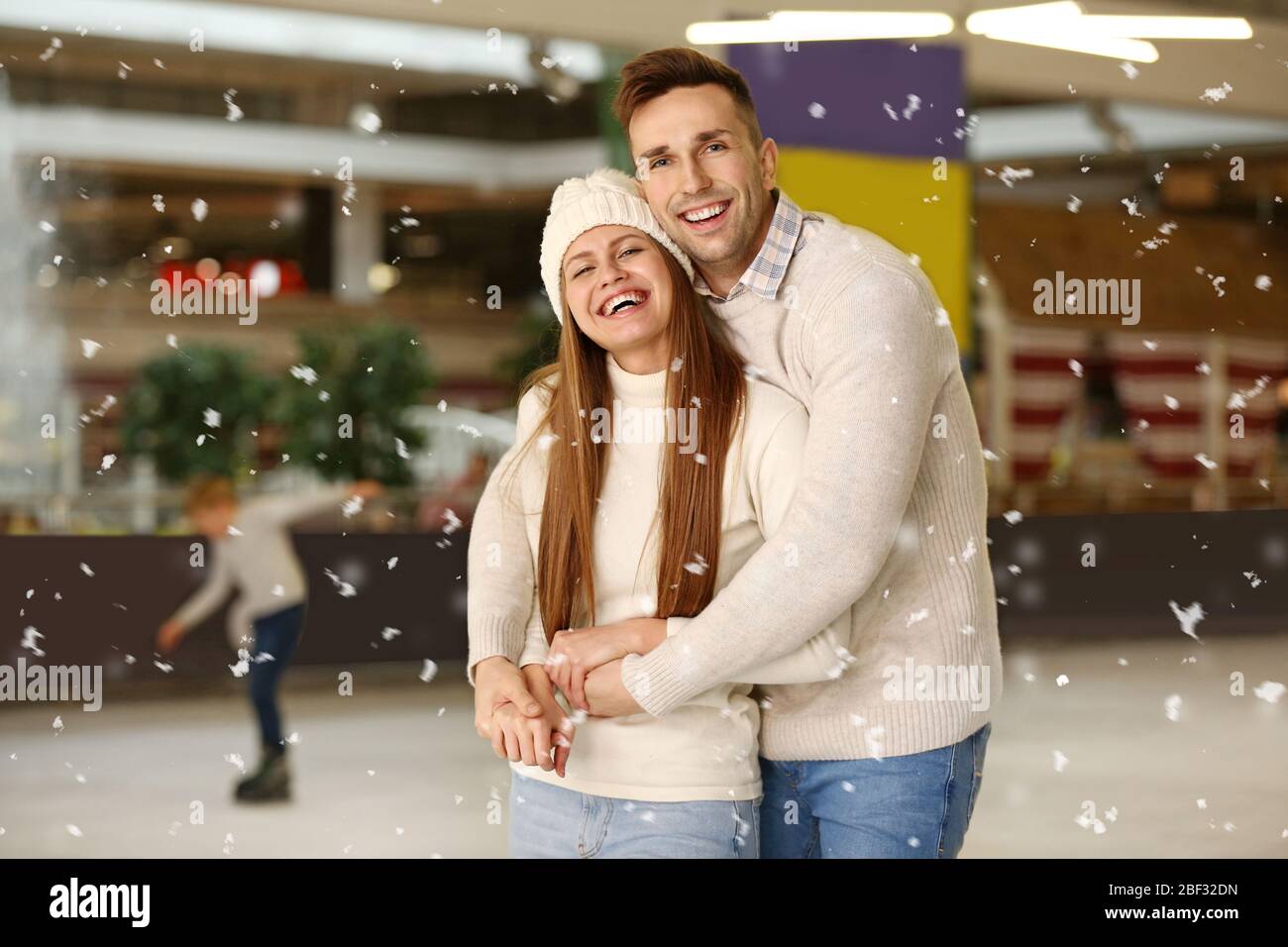 Couple falling ice skating hi-res stock photography and images - Alamy