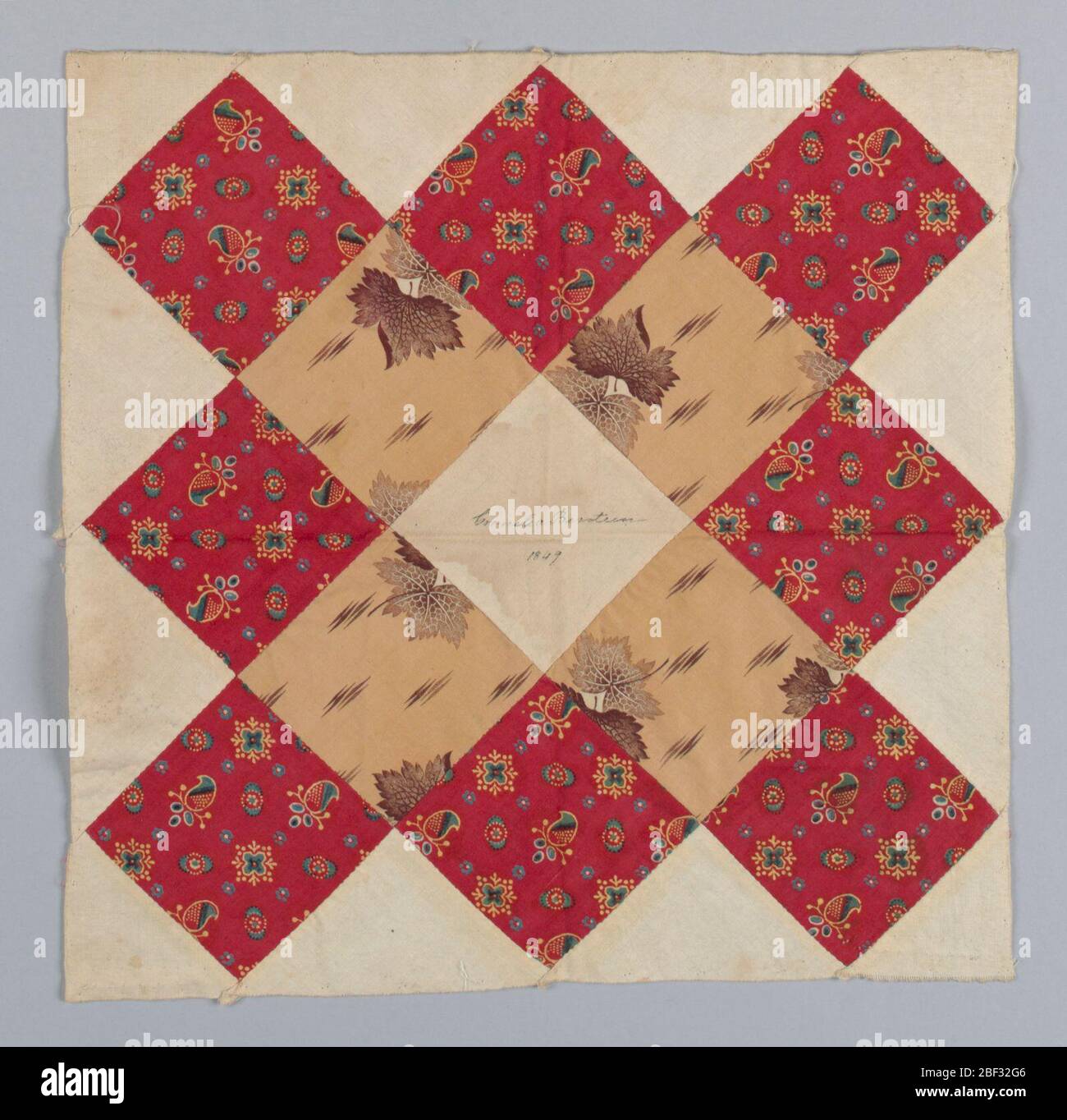 Patchwork square. Patchwork square made up of diamonds of unbleached ...