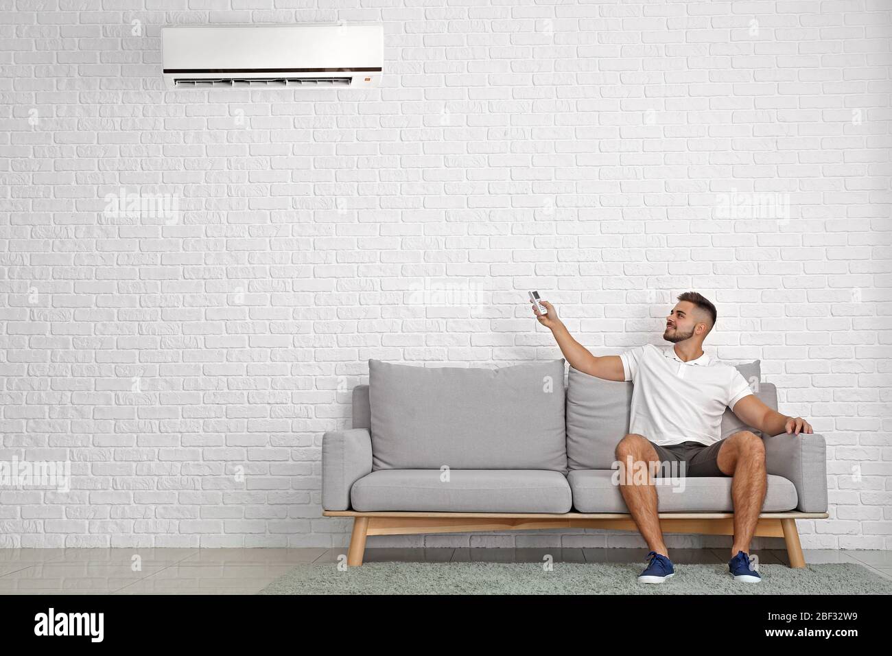 Man control operate air conditioner hi-res stock photography and images ...