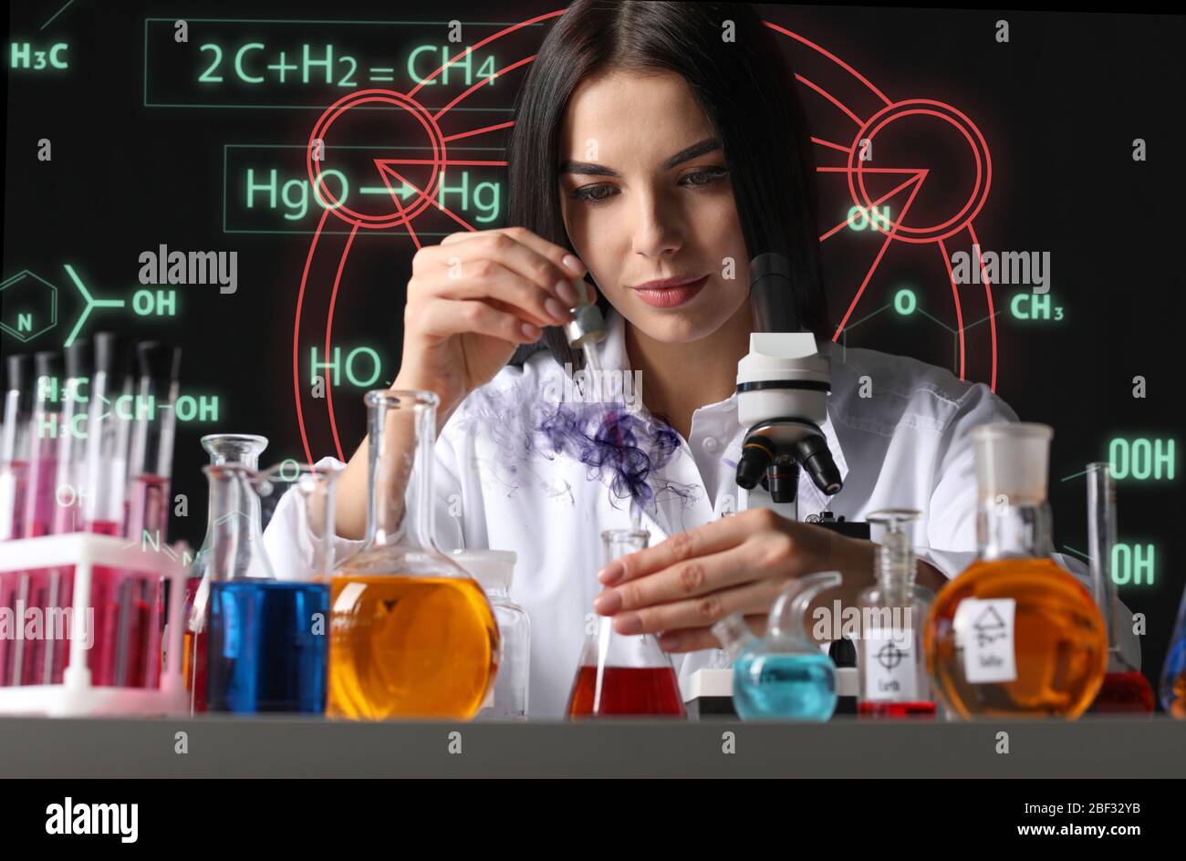 Female alchemist making elixir in laboratory Stock Photo - Alamy