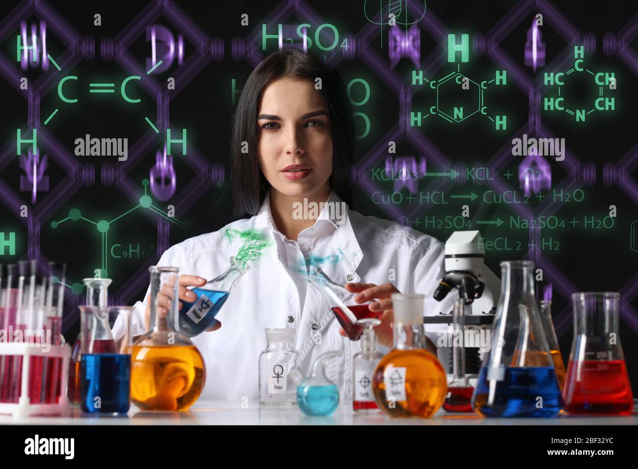 Female alchemist making potions in laboratory Stock Photo - Alamy