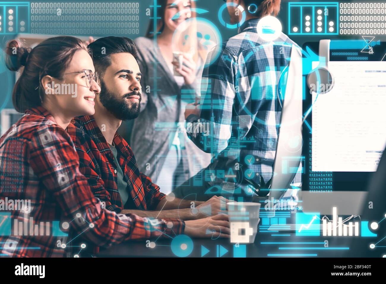 Group programmers sitting table hi-res stock photography and images - Alamy