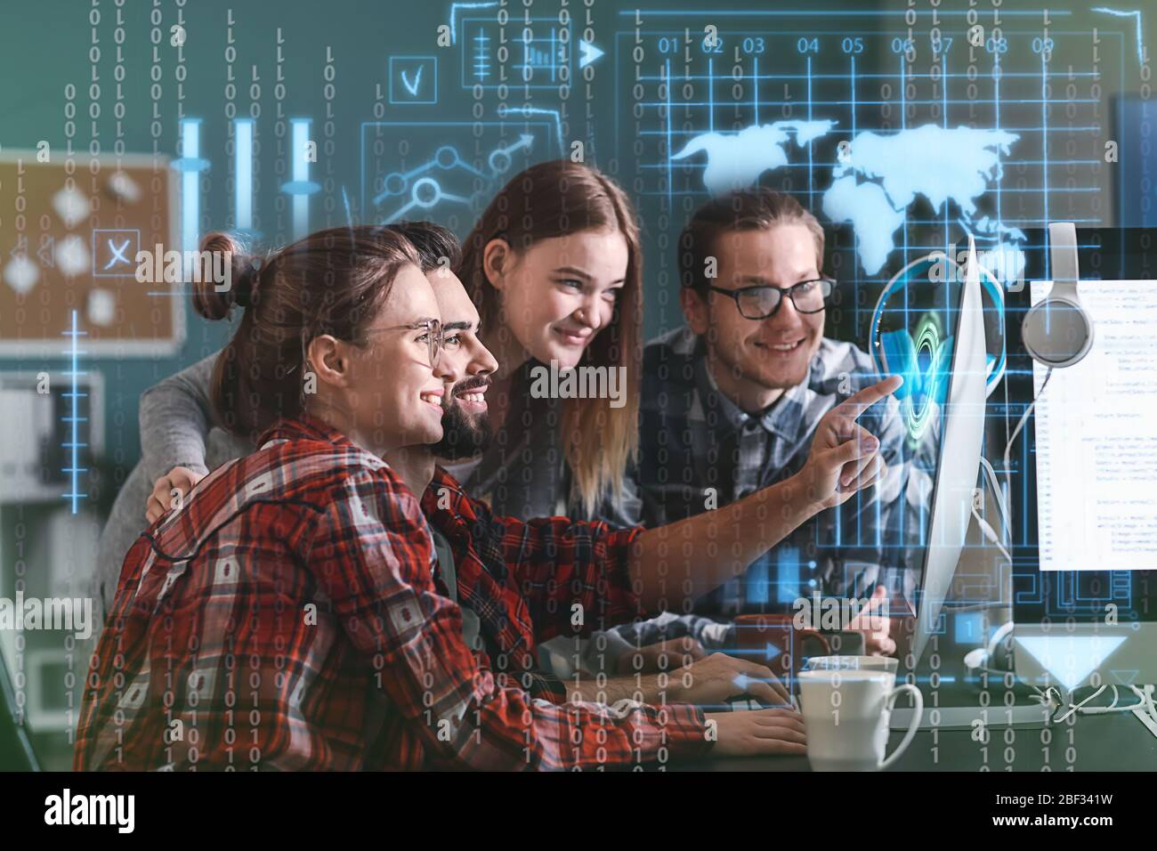 Group programmers sitting table hi-res stock photography and images - Alamy