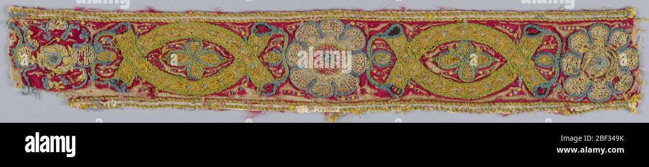 Band. Fragment of an embroidered band with intersecting arcs ...