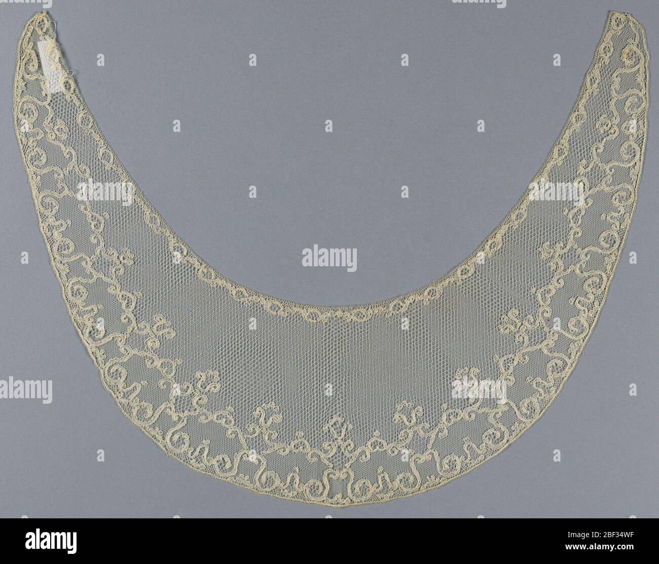 Collar. Mechlin-style collar with an ornamental border and compartments ...