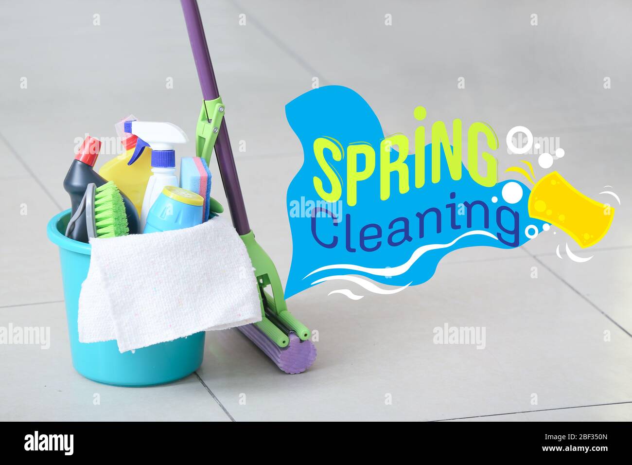Set of supplies on floor in room. Spring cleaning Stock Photo - Alamy