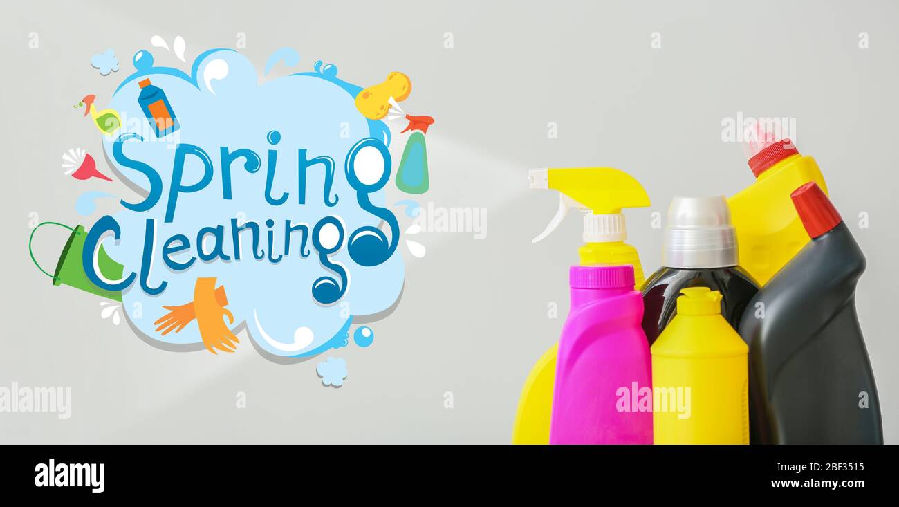 Set of detergents on light background. Spring cleaning Stock Photo - Alamy