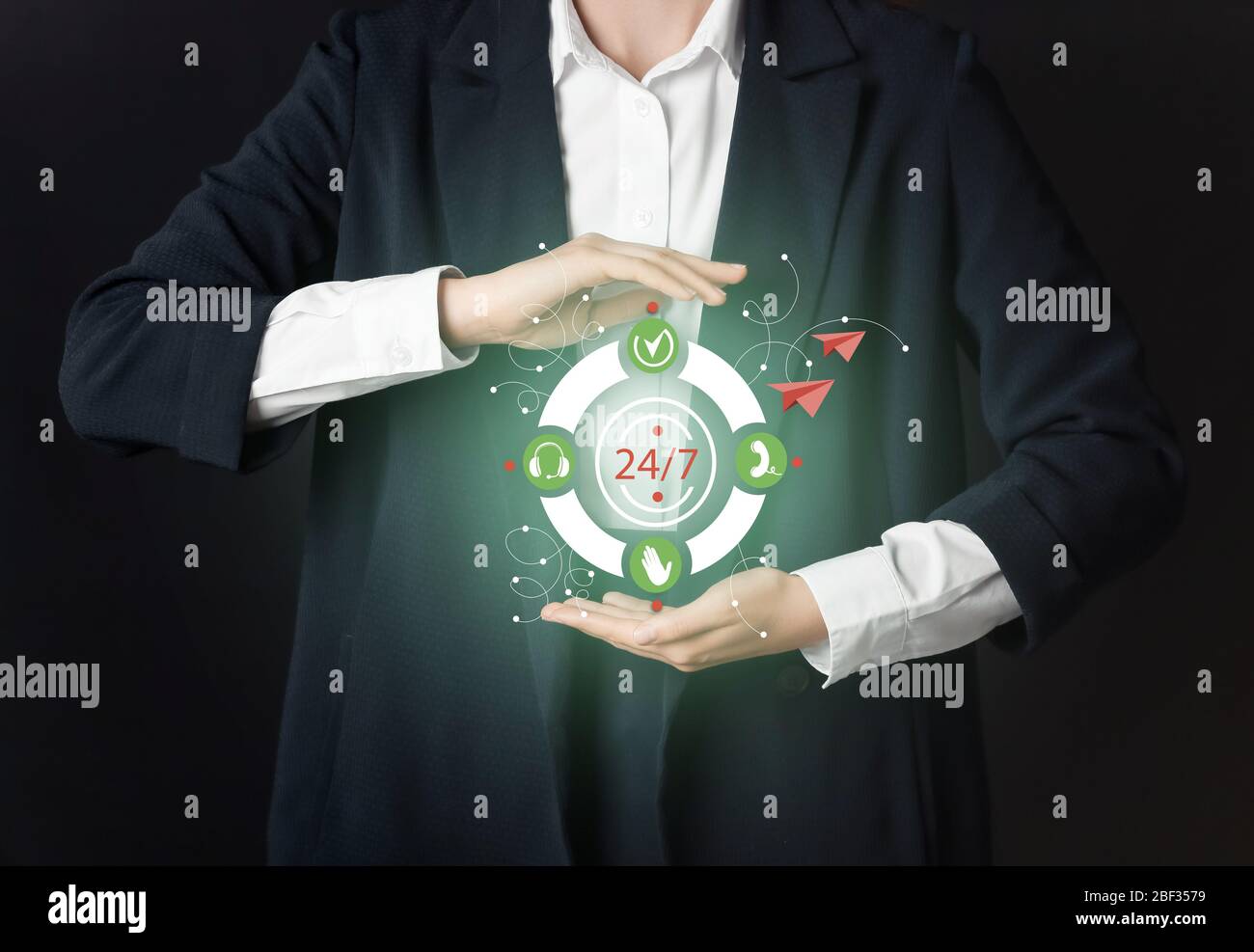 Technical support agent with icon of virtual call center on dark ...