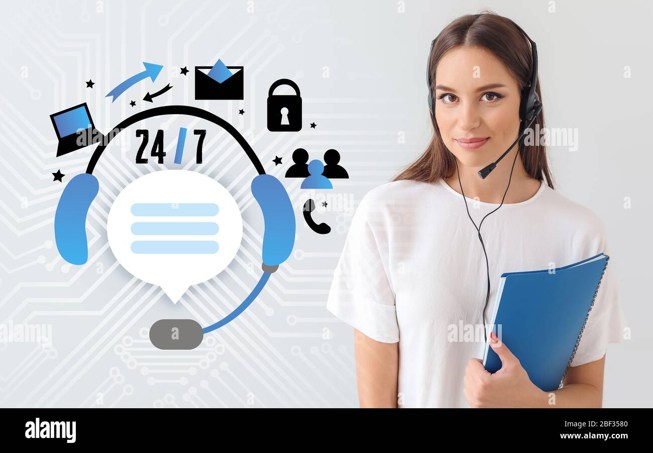 Female technical support agent on light background Stock Photo - Alamy