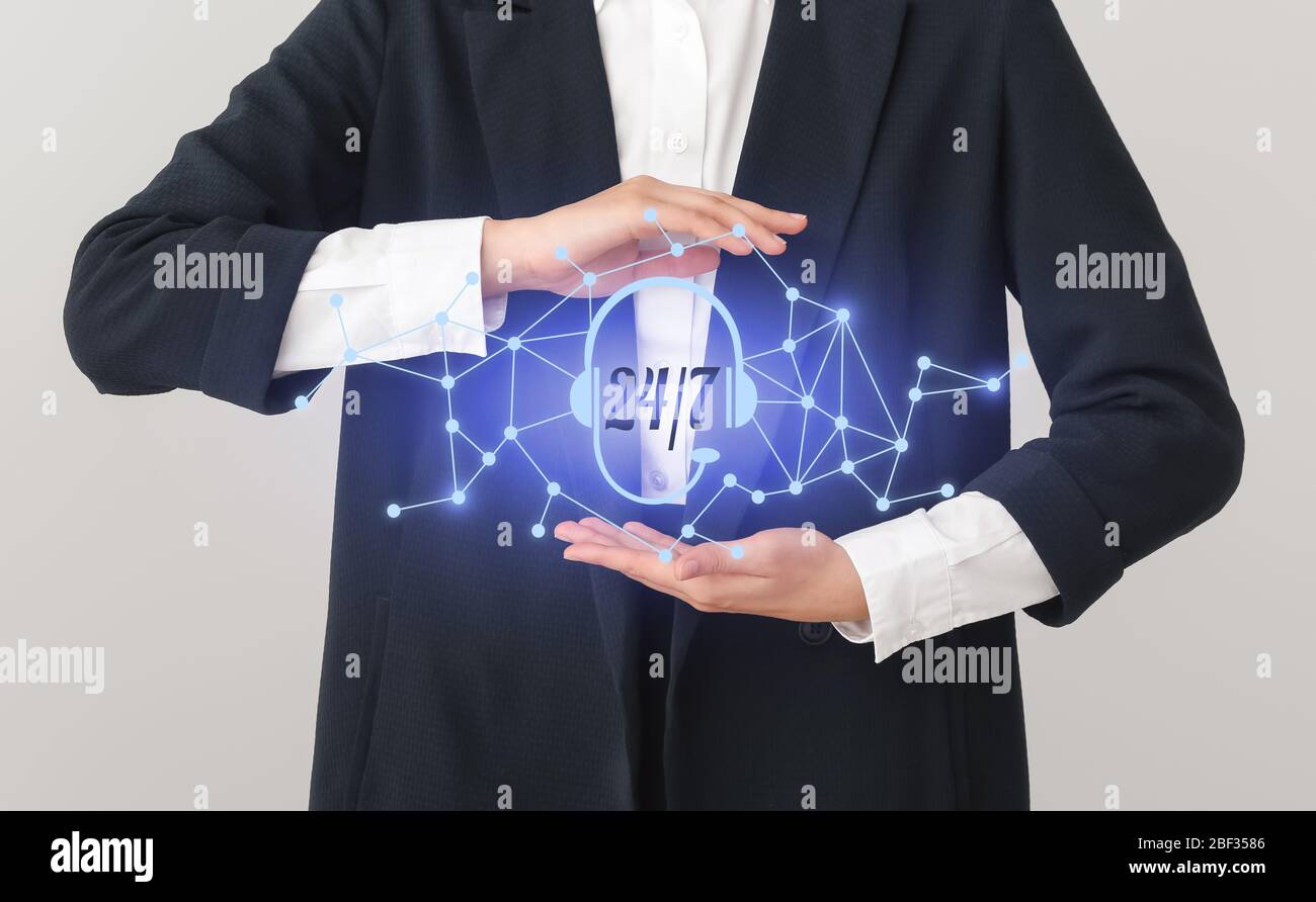 Technical support agent with icon of virtual call center on grey ...