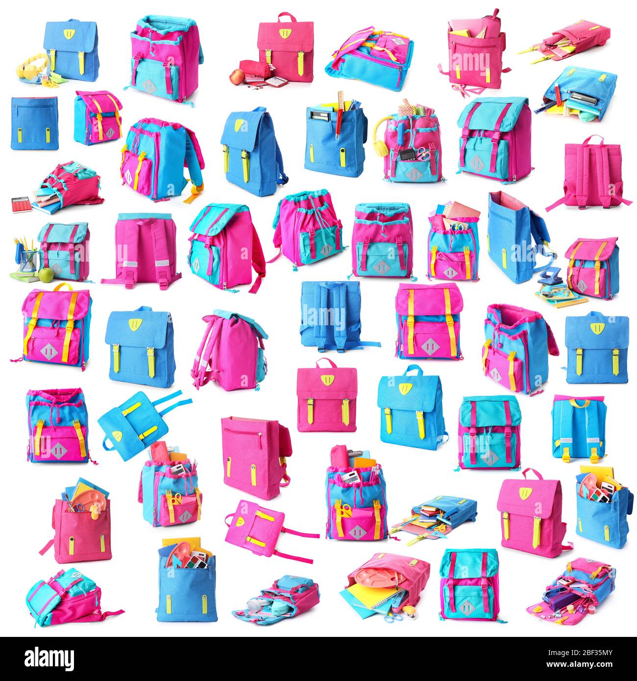 Many school backpacks on white background Stock Photo - Alamy