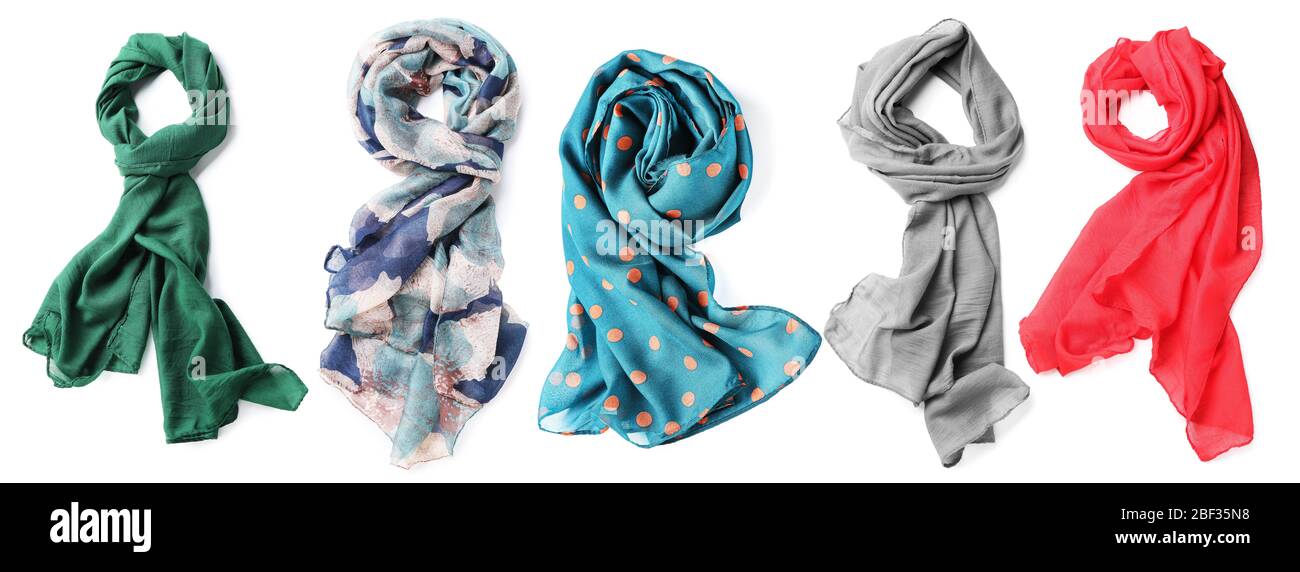 Different beautiful scarves on white background Stock Photo - Alamy