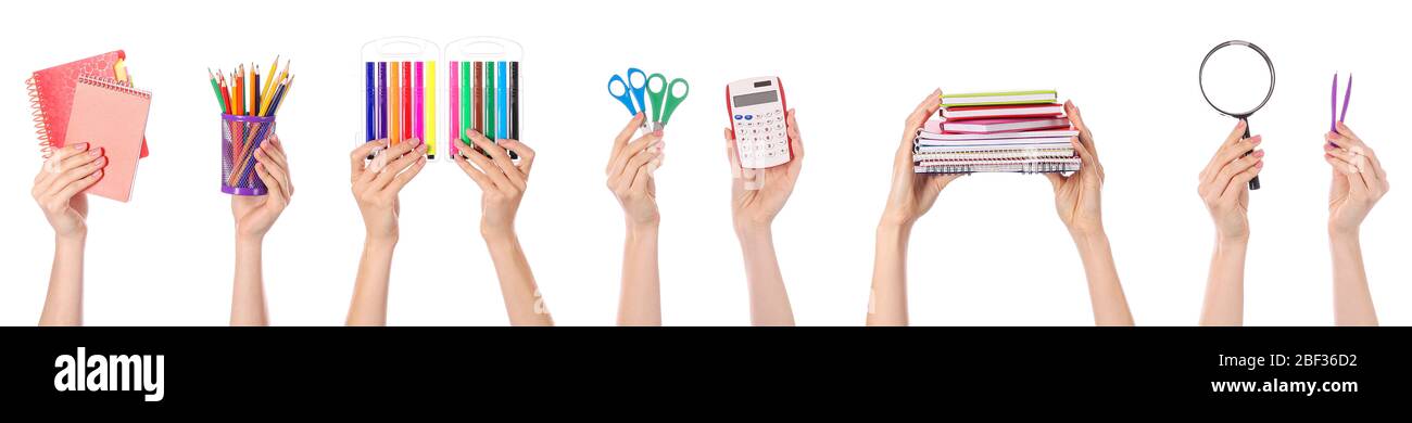 Many hands with school supplies on white background Stock Photo - Alamy
