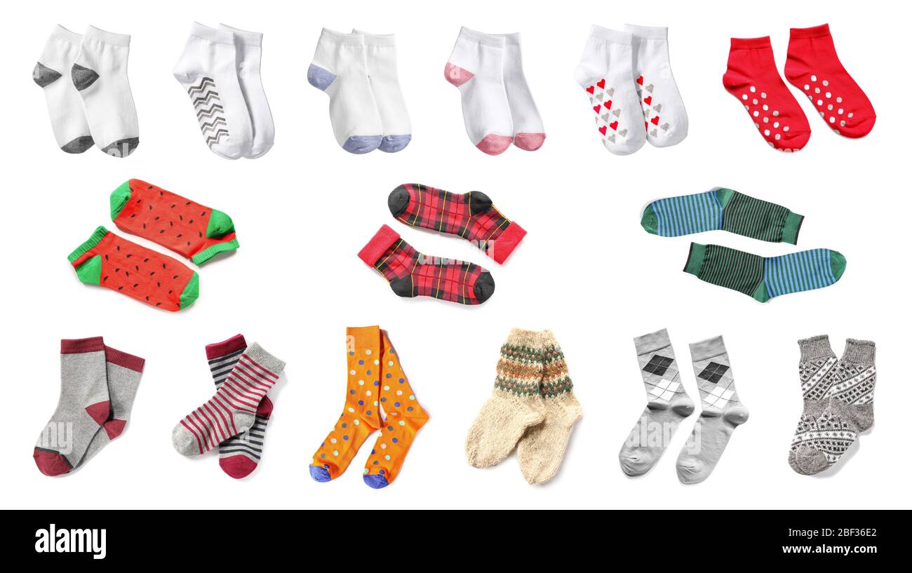 Many different socks on white background Stock Photo - Alamy