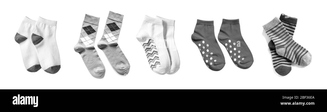 Many different socks on white background Stock Photo - Alamy