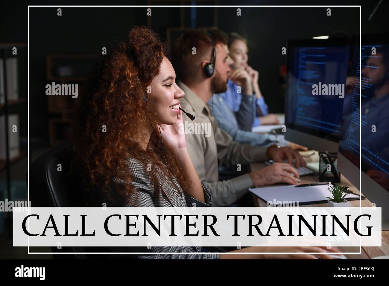 Technical support agents training in office at night Stock Photo - Alamy