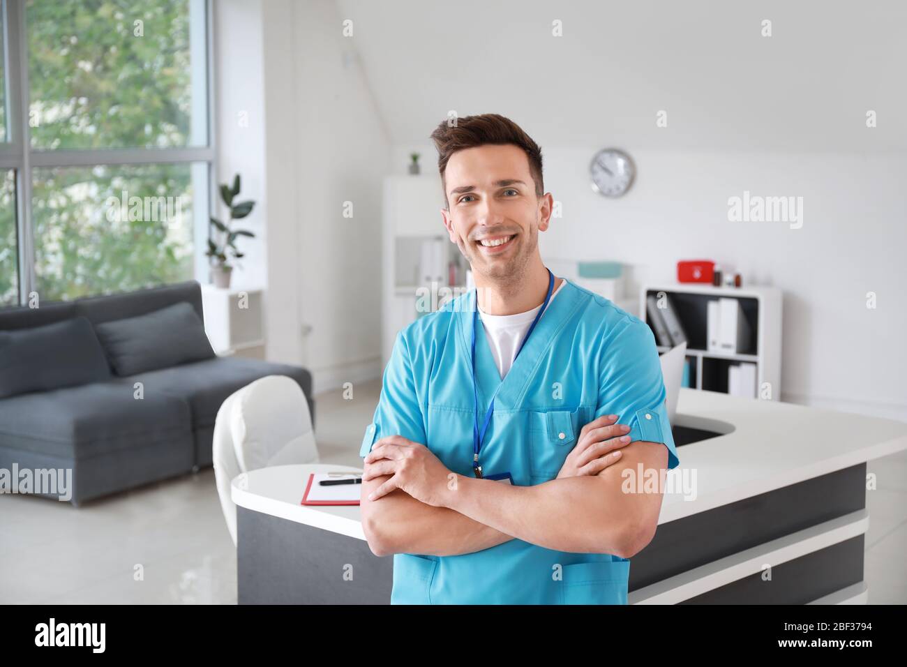 Modern clinic receptionist hi-res stock photography and images - Alamy