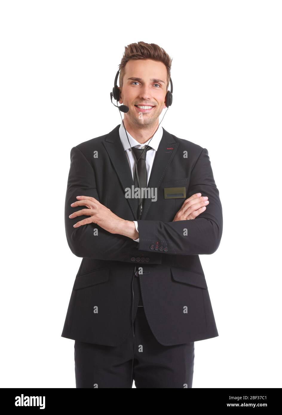 Portrait of male receptionist on white background Stock Photo - Alamy