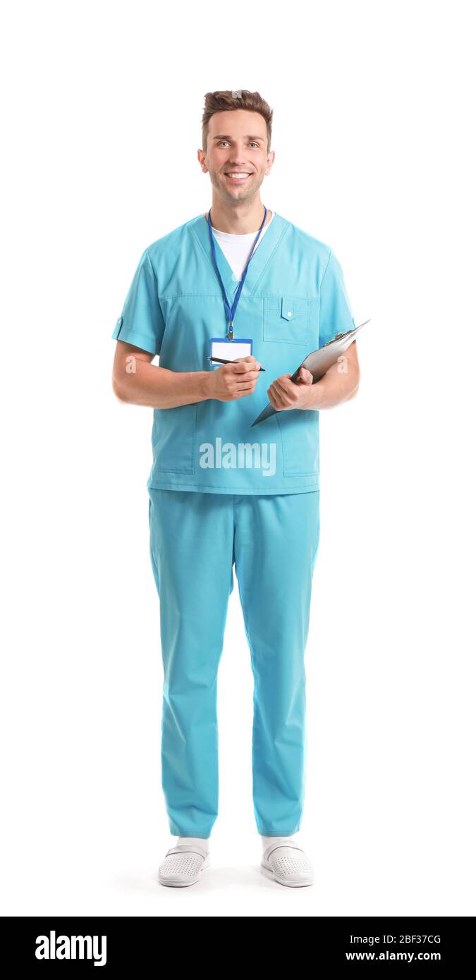 Portrait of male receptionist in medical uniform on white background ...