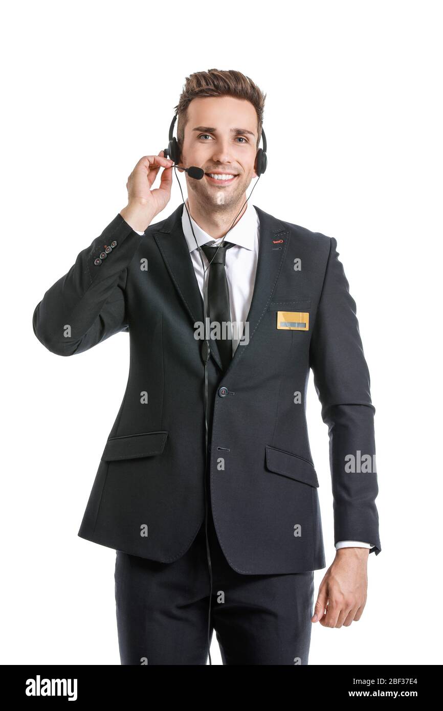 Portrait of male receptionist on white background Stock Photo - Alamy