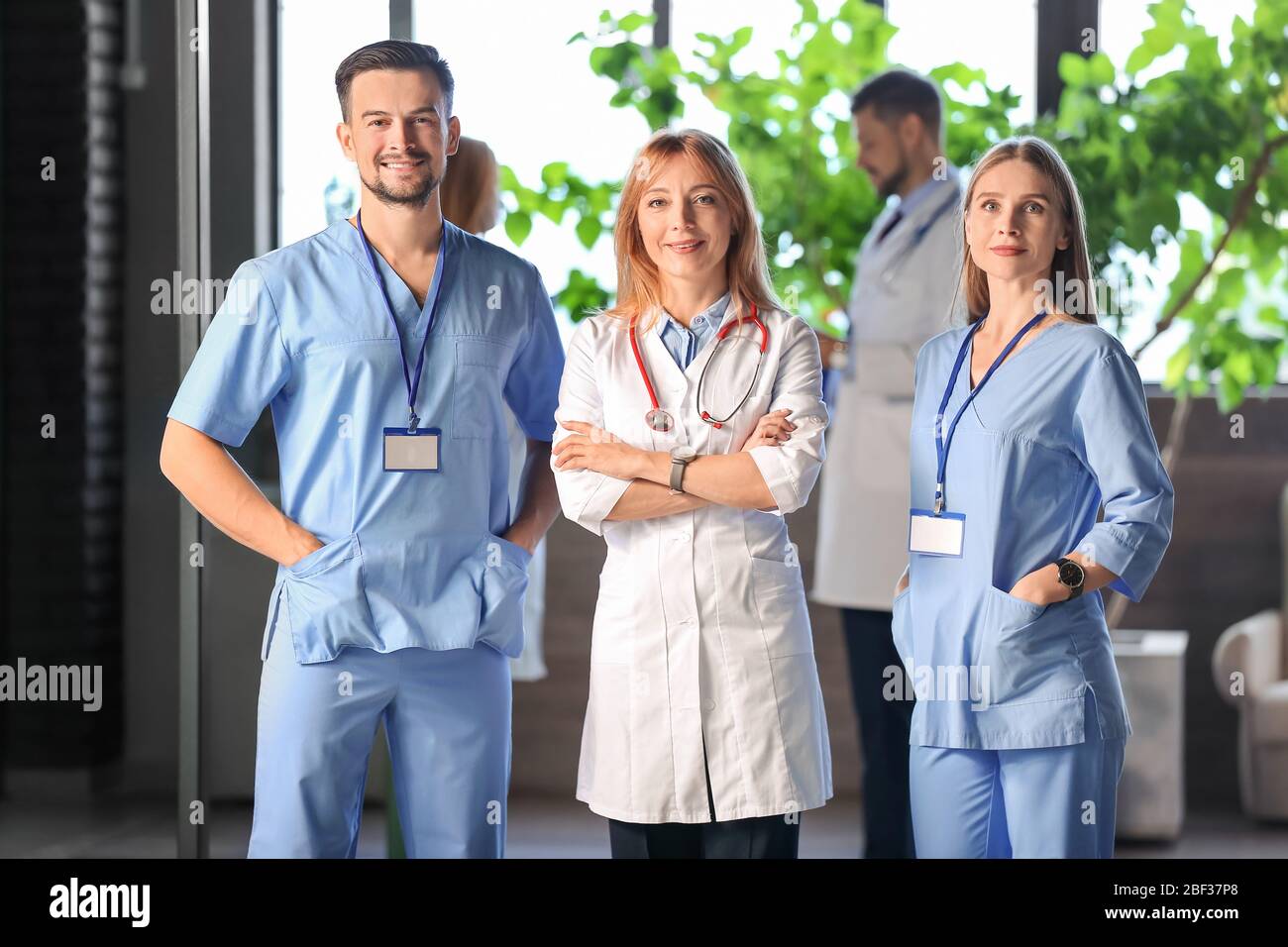 Team of doctors in hall of clinic Stock Photo - Alamy
