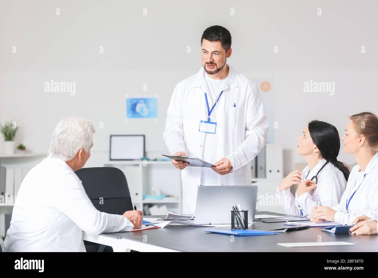 Team of doctors during meeting in clinic Stock Photo - Alamy